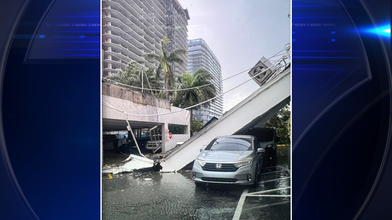 Partial building collapse in Hallandale Beach traps two vehicles under ...