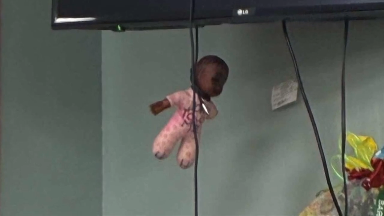 Viral video captures Tampa middle school teacher hanging Black baby ...